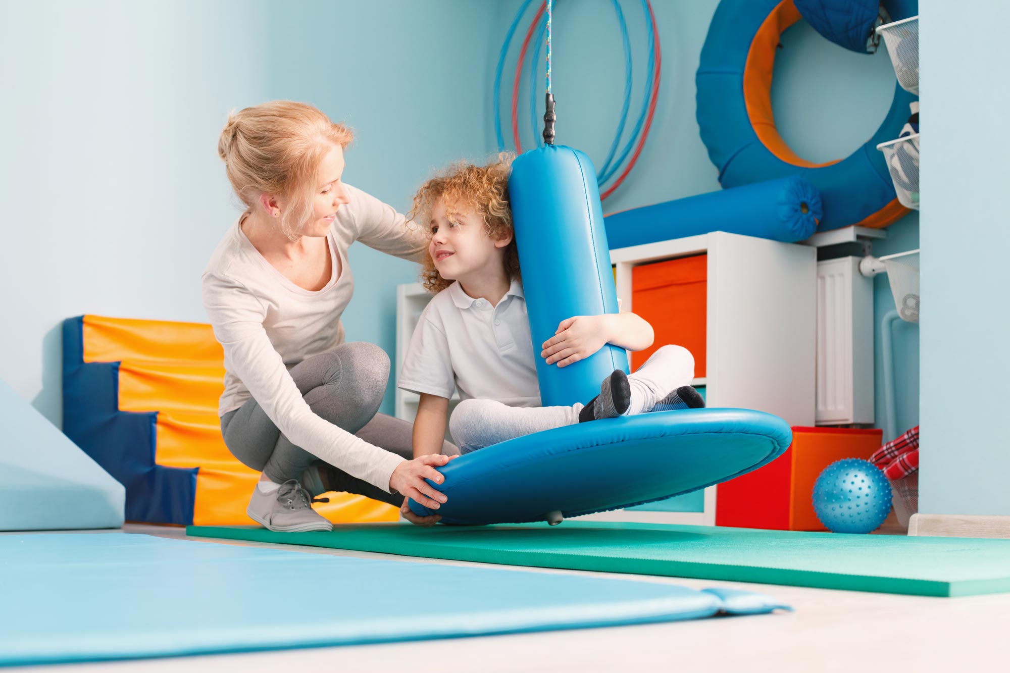 Boy using sensory integration equipment PMBVFT4 Promise A b a